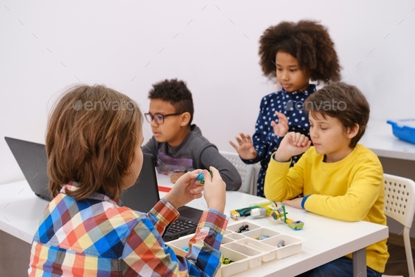 Diverse students in programming school learning to code Stock Photo by ...