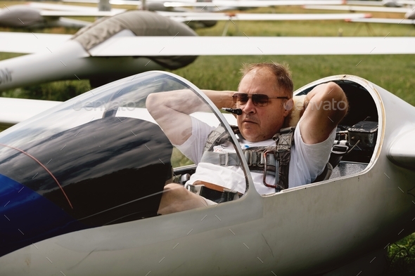 Glider pilot getting ready for flight on small motorless aircraft Stock ...