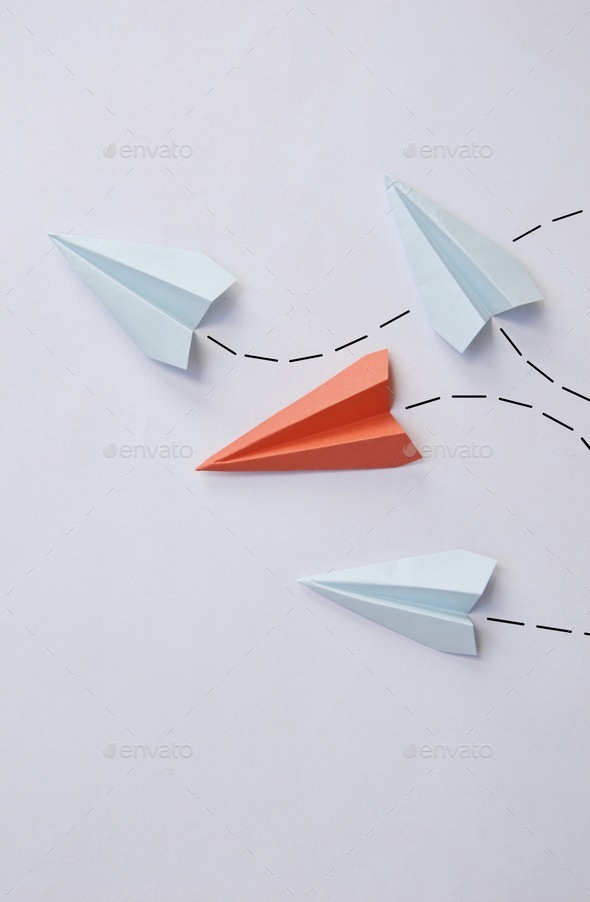 Overhead photo of different colored airplanes flying in different ...
