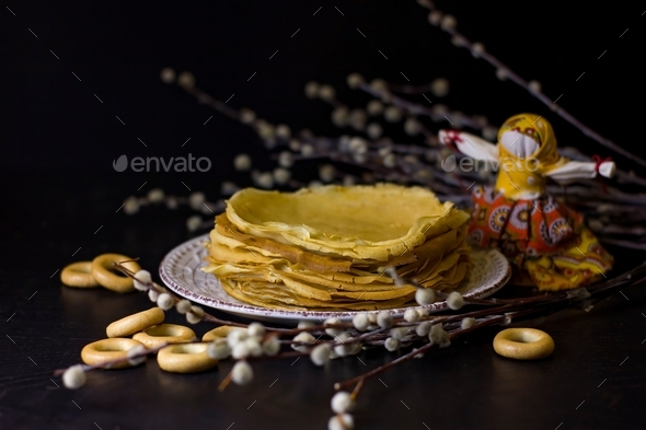 Background with pancakes, textile dolls, sushki, and pussy-willow for ...