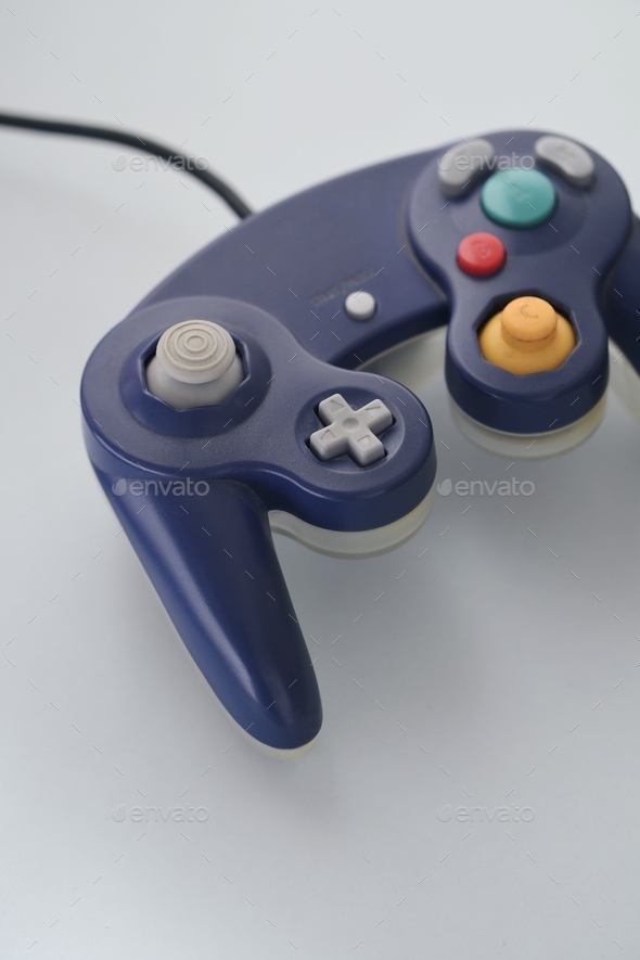 Photo of a blue joystick video game controller Stock Photo by lindaze