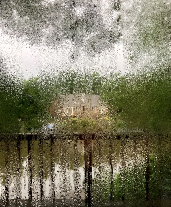 Condensed window’s view due to different temperatures inside & outside ...