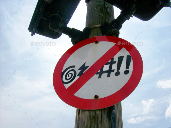 No Cursing sign on a city’s street post. Stock Photo by MyLove4Art