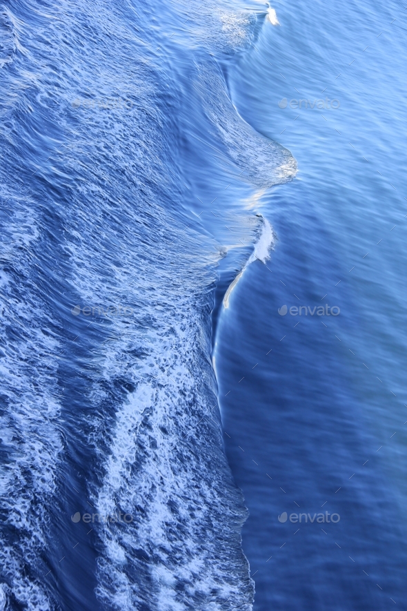 Gorgeous aerial view of the majestic blue ocean with natural ripples ...