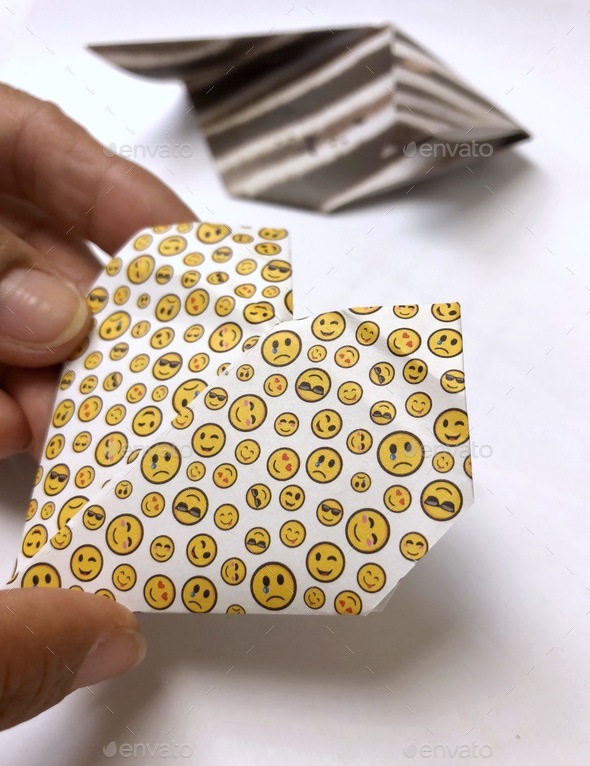 Heart happy face emoji Japanese origami art folding paper into ...