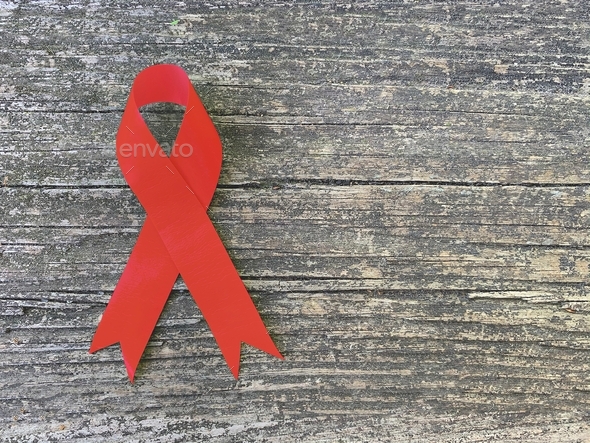 Red ribbon symbolize addiction blood cancer heart disease tuberculosis ...
