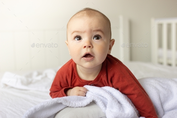 A child with a funny freak. Children's emotions. Morning in the nursery ...