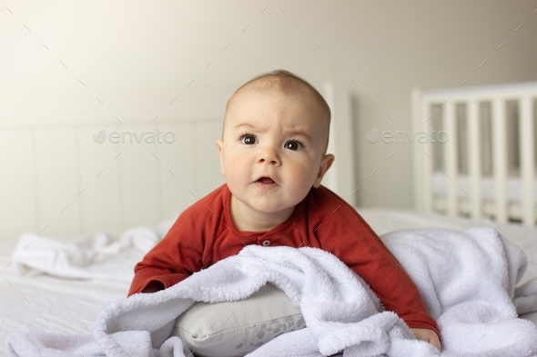 A child with a funny freak. Children's emotions. Morning in the nursery ...