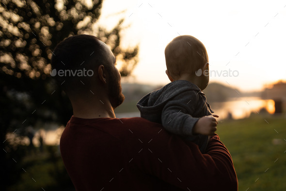 Father and his son meet the dawn. Fatherly love. The relationship ...