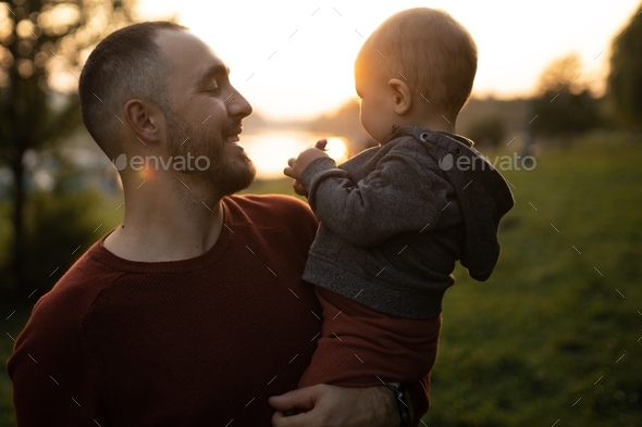 Father and his son meet the dawn. Fatherly love. The relationship ...