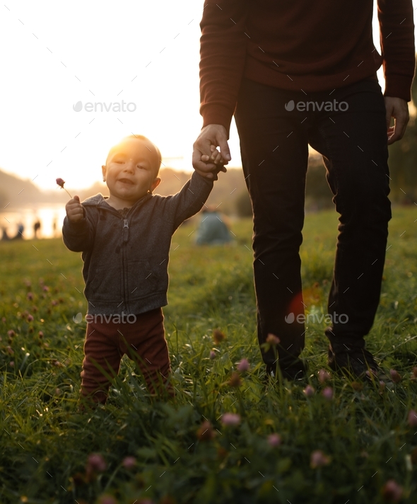 Father and his son meet the dawn. Fatherly love. The relationship ...