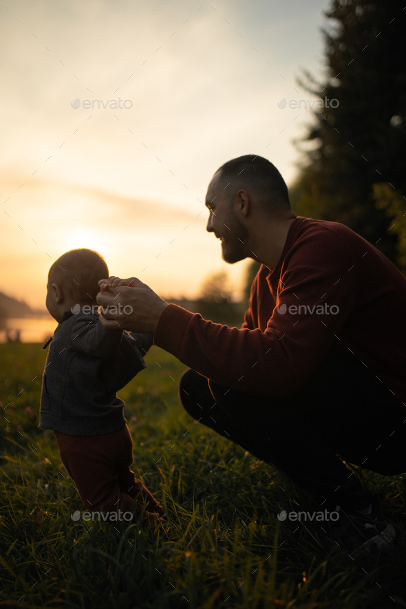 Father and his son meet the dawn. Fatherly love. The relationship ...