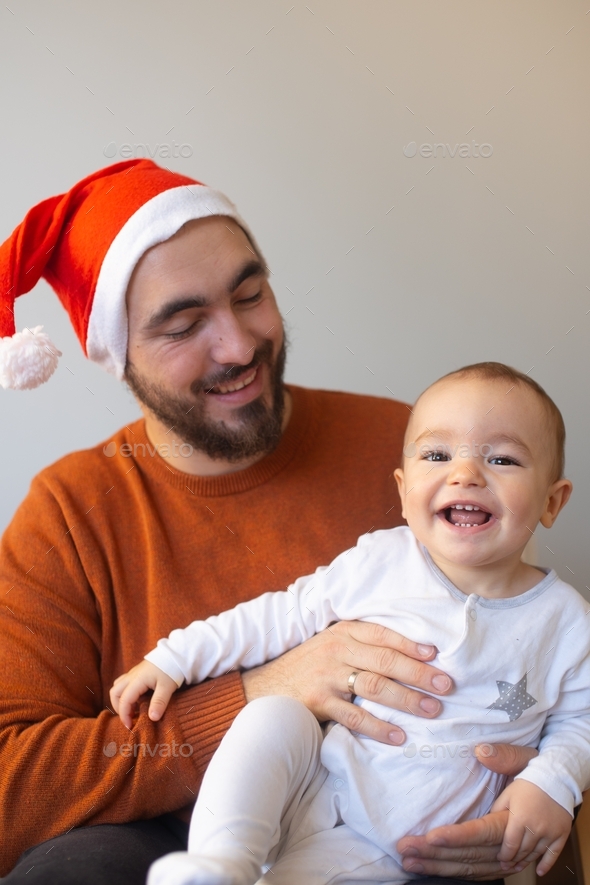 Dad and his son are getting ready to celebrate Christmas. Dad and son. Happy childhood ...