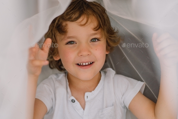 Happy little kid smiling. Emotions on the face. Portrait of a happy ...