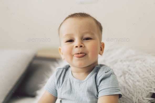 Happy little Boy. Portrait of a cute little boy in a bedroom. Stock ...