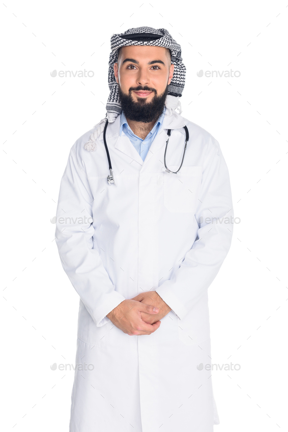 smiling muslim doctor with headscarf and stethoscope isolated on white ...