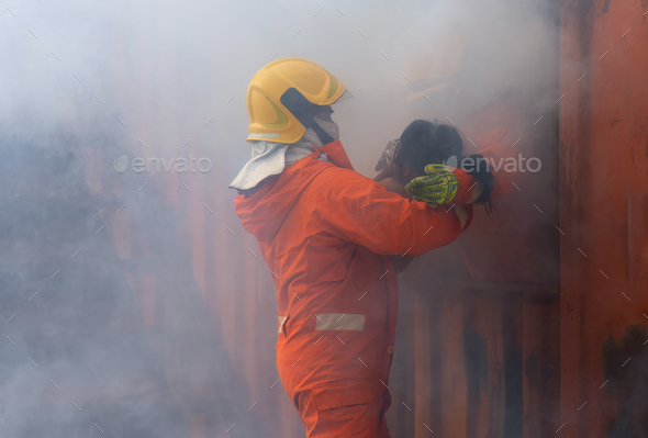 Fire fighting team rescue life saving young girl from fire burn and ...