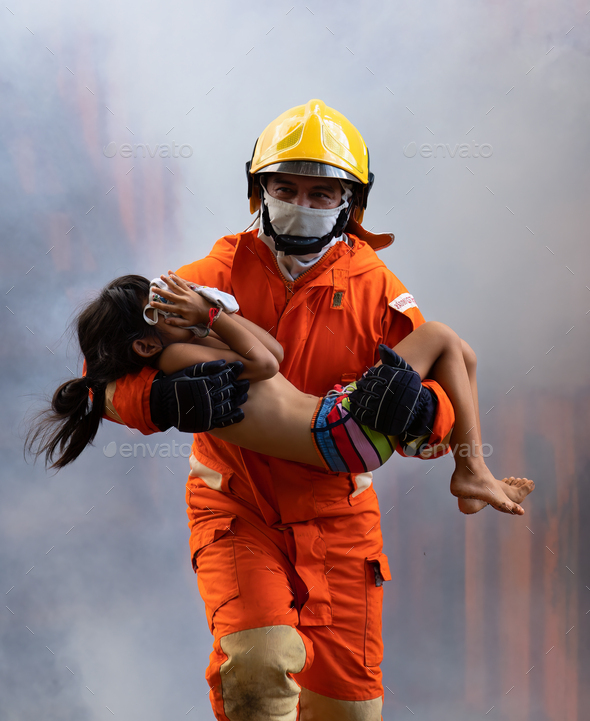 Fire fighting team rescue life saving young girl from fire burn and ...