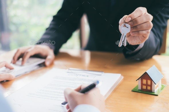 Transfer house ownership. Stock Photo by ijeab | PhotoDune