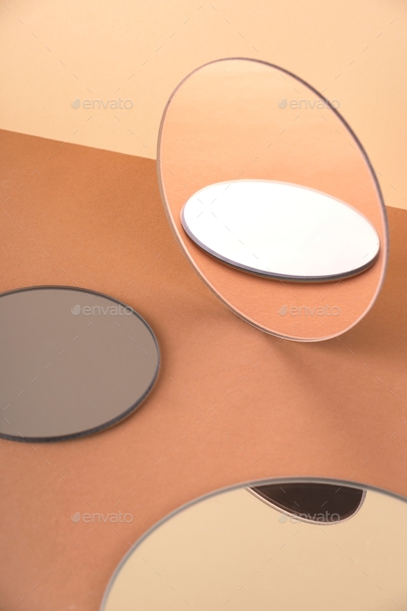 Round mirrors on a neutral background. Abstract shapes and background ...