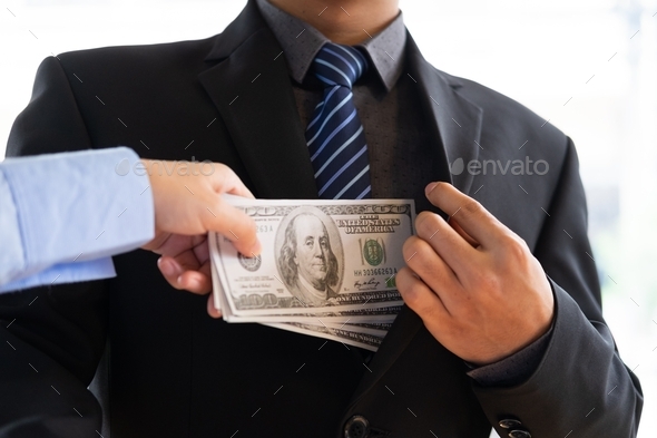 Bribery and corruption concepts. Stock Photo by ijeab | PhotoDune