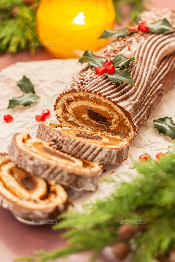 Traditional Christmas cake, chocolate Yule log with festive decorations ...