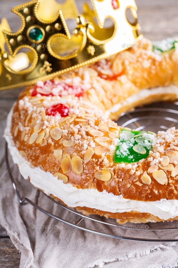Traditional Spanish Epiphany cake, Roscon de Reyes with festive ...