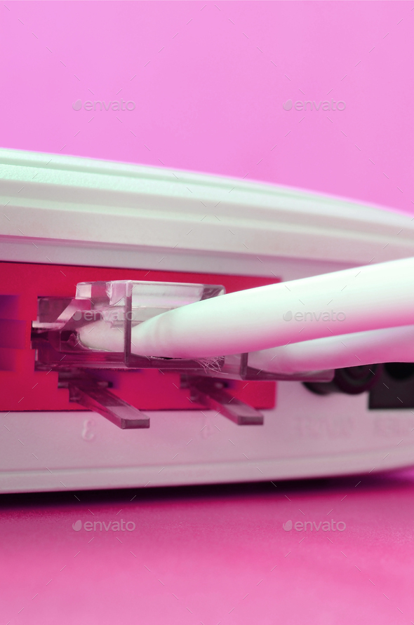 The Internet cable plugs are connected to the Internet router Stock ...