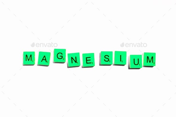 Magnesium - scrabble letters word on a white background Stock Photo by ...