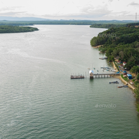 Aerial view of a jetty and fishing boats at a river in Johor, Malaysia ...