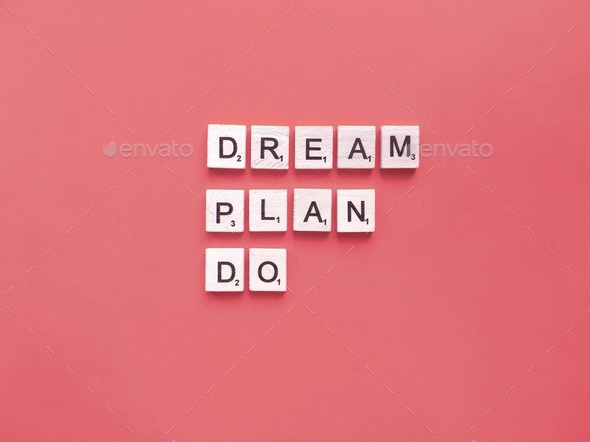 Dream. Plan. Do scrabble letters word on a pink background Stock Photo ...