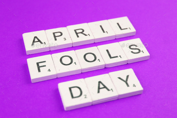 April fools day scrabble letters word on a purple background Stock ...