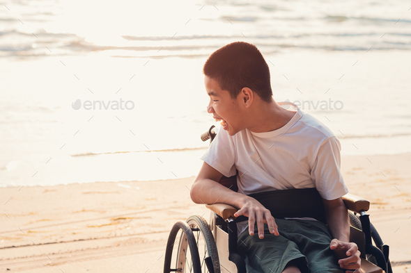 Disabled child on wheelchair smile face with happy travel holidays with ...