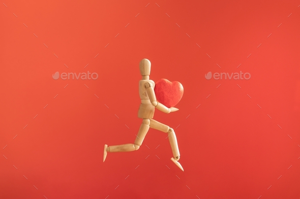 Wooden mannequin. Running man. Stock Photo by vozdvizhenskayadina