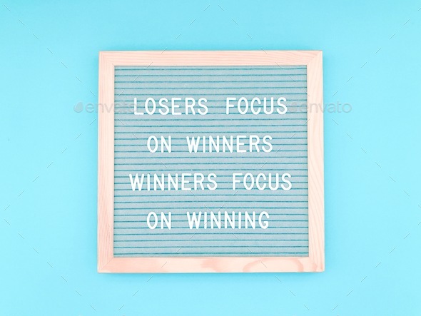 Losers focus on winners. Winners focus on winning. Quote. Stock Photo ...