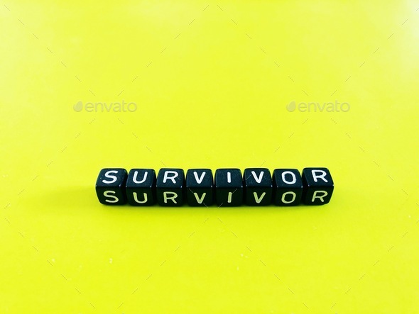 Survivor. Letter blocks. Alphabet letters. Word. Words. Yellow background. Stock Photo by wanaktek