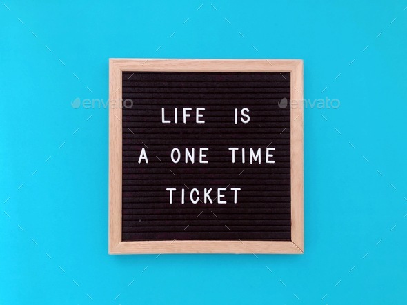 Life is a one time ticket Stock Photo by wanaktek | PhotoDune