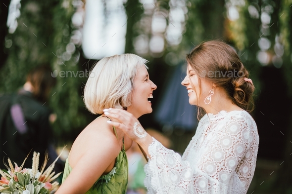 Real emotion when happy bridesmaid caught the wedding bouquet Stock ...