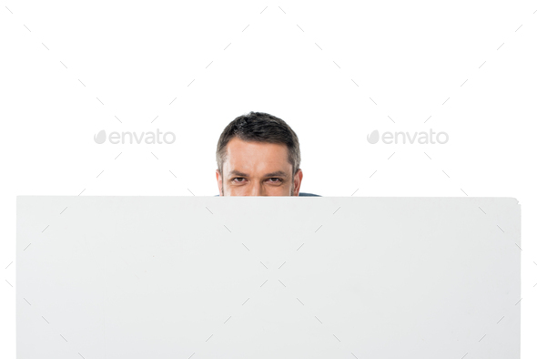 obscured view of man hiding behind banner isolated on white Stock Photo ...