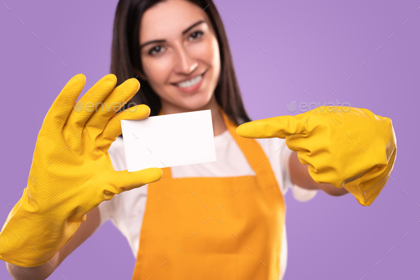 Friendly maid showing blank card Stock Photo by kegfire | PhotoDune