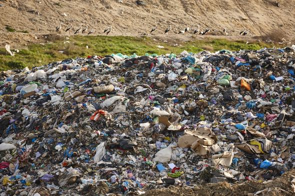 Open air garbage dump. Plastic waste pollution. Recycling junk. Ecology ...