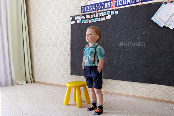 The boy answers at the blackboard in the classroom at school Stock ...