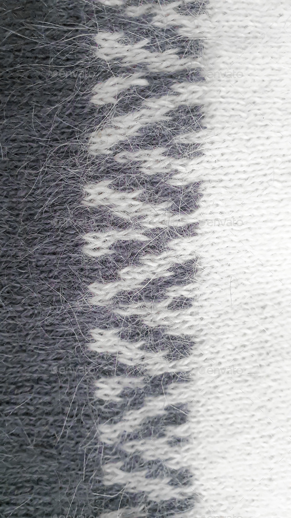 Handmade sweater. Knitted fabric from mink thread. White and gray color ...