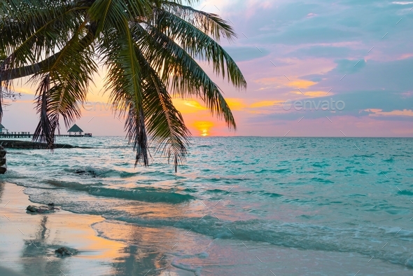 picturesque sunrise in the Maldives island, the sun rising from the ...