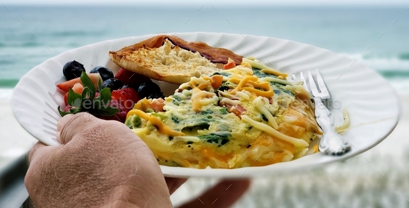 Overhead food from above served in outdoor living space on deck during ...