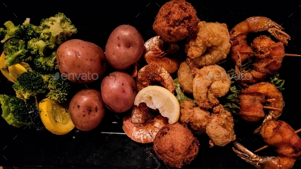 Overhead food flat lay of food from above in the dark. Stock Photo by ...
