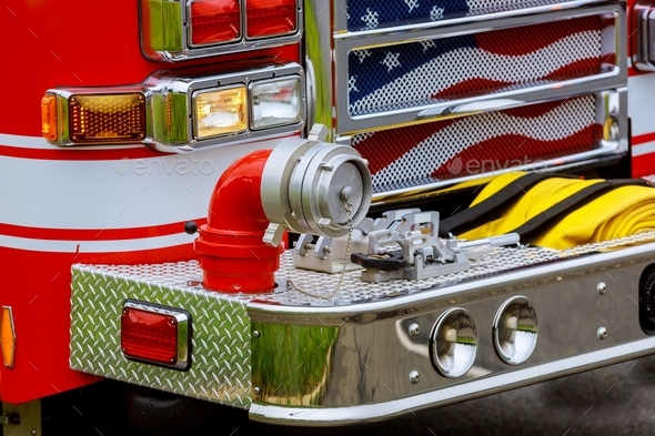 Part of the interior of a modern fire engine showing tools and ...