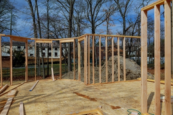 Wood frame interior of a new house under construction Stock Photo by ...