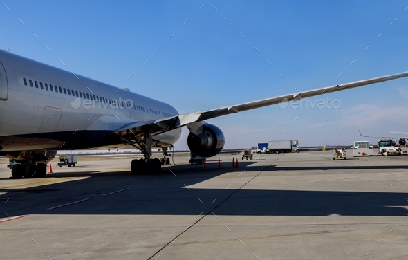 Loading aircraft at the International Airport jet engine against a ...