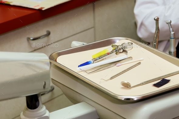 Different dental instruments and tools in a dentists office. Set ...
